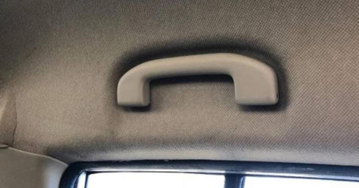 Someone figured out what that handle on car ceilings is for and people ...