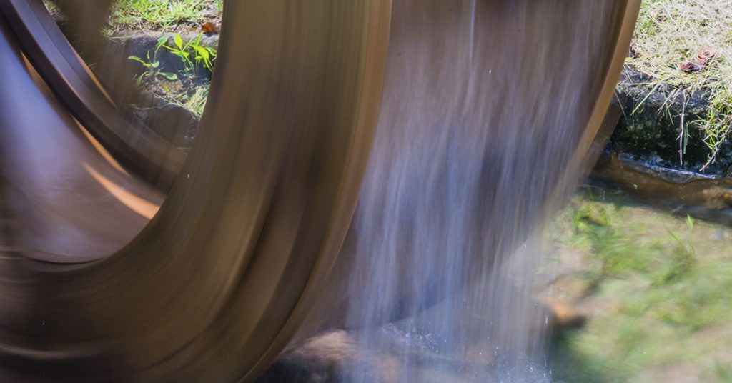 This man generates free electricity using a water wheel