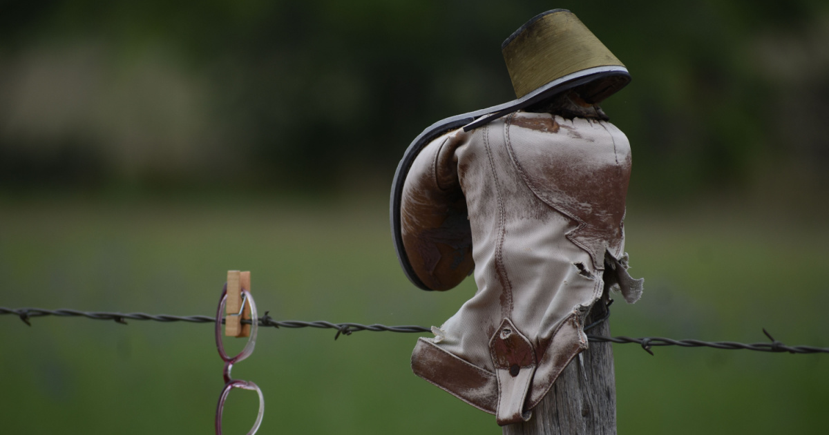 What’s the Meaning of a Boot on a Fence Post?